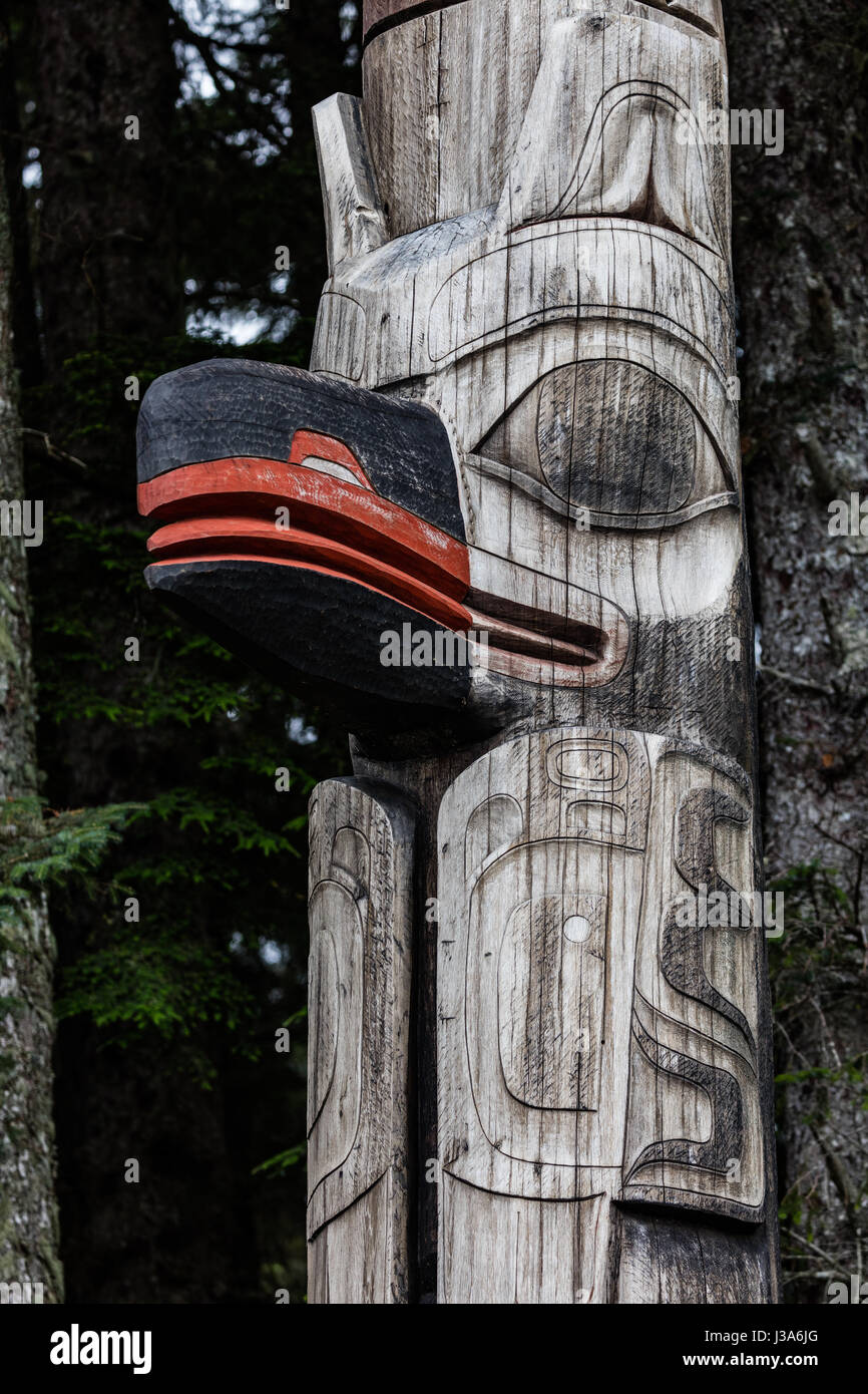 Native American totem poles in Alaska Stock Photo - Alamy