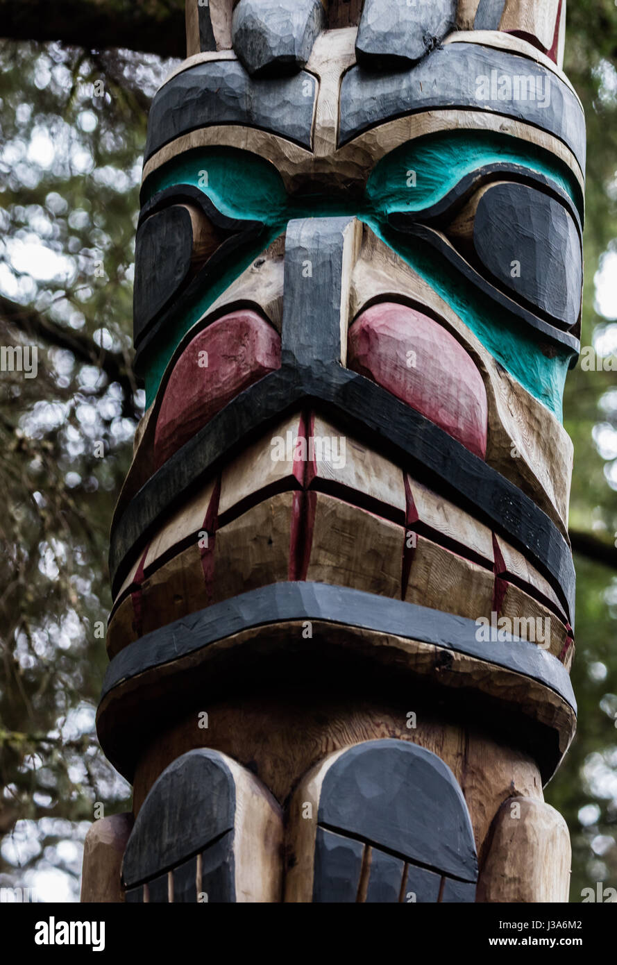 Native American totem poles in Alaska Stock Photo - Alamy