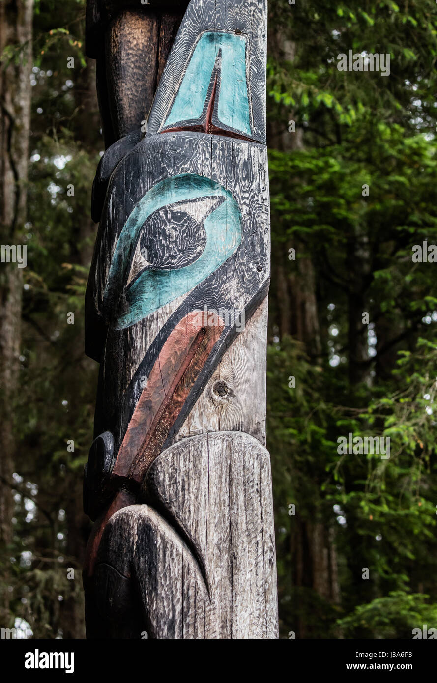 Native American totem poles in Alaska Stock Photo - Alamy