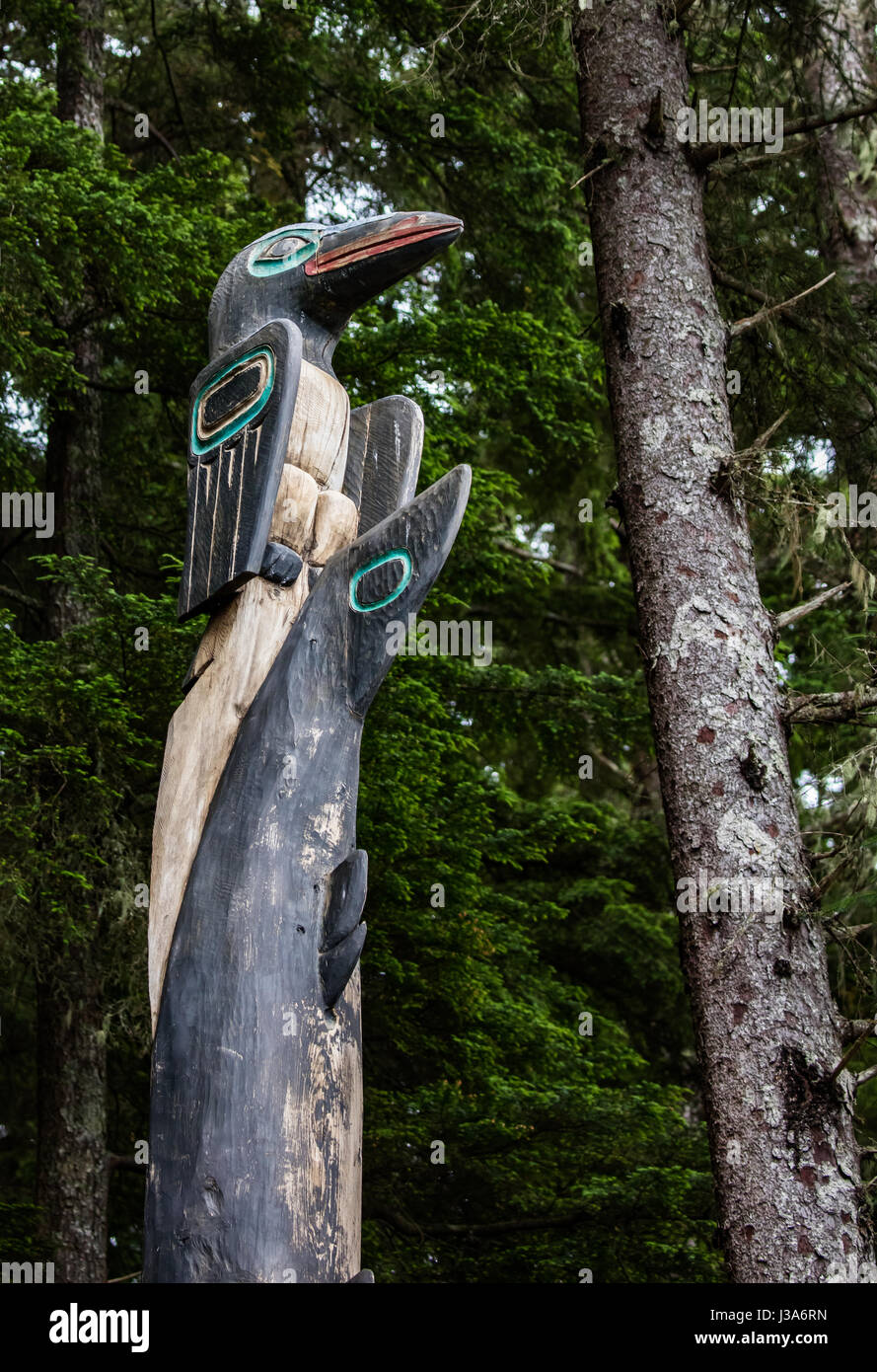 Native American totem poles in Alaska Stock Photo - Alamy