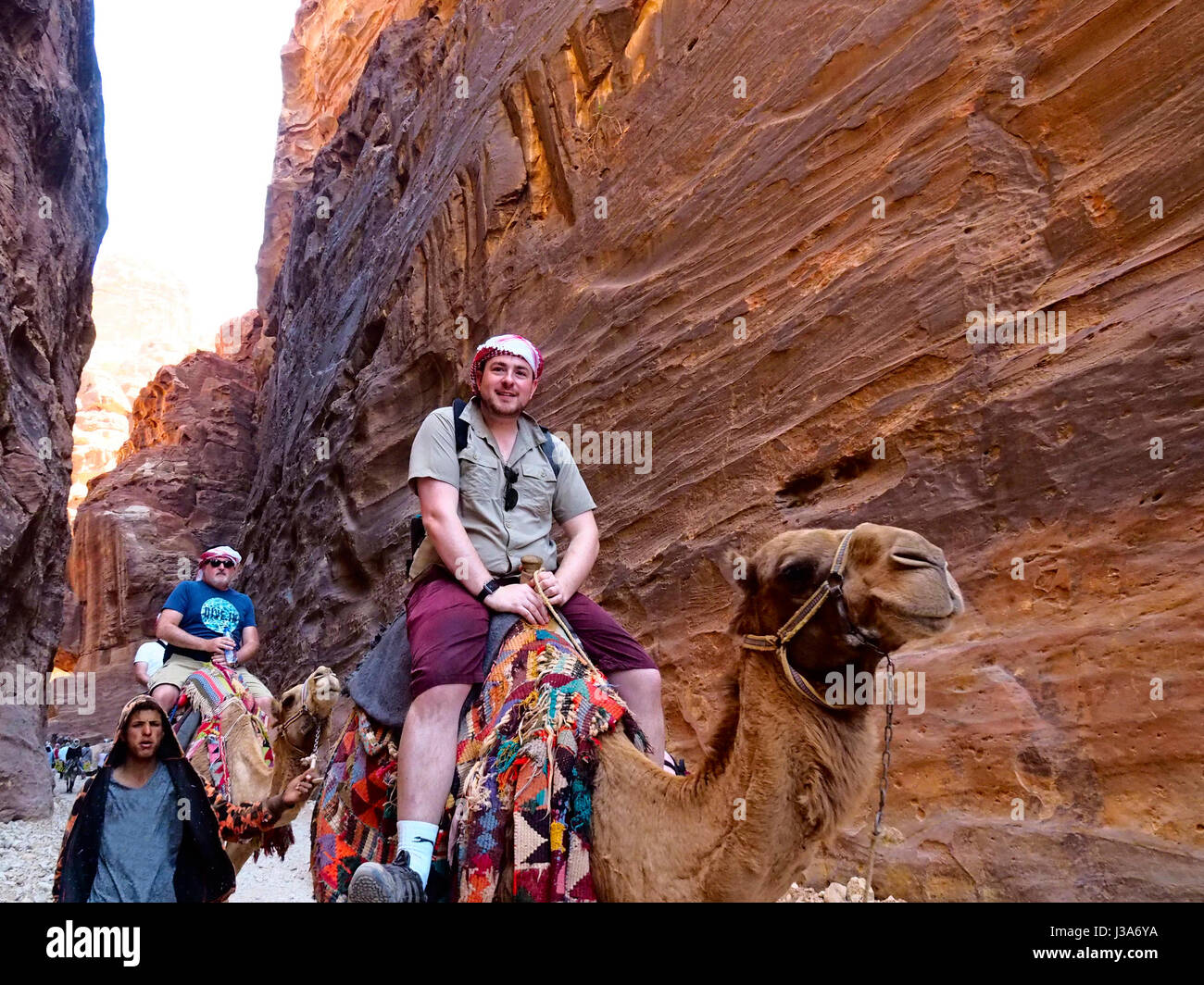 Camel riding at Petra Stock Photo - Alamy