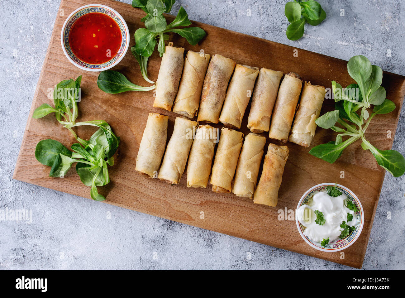 Fried spring rolls with sauce Stock Photo - Alamy