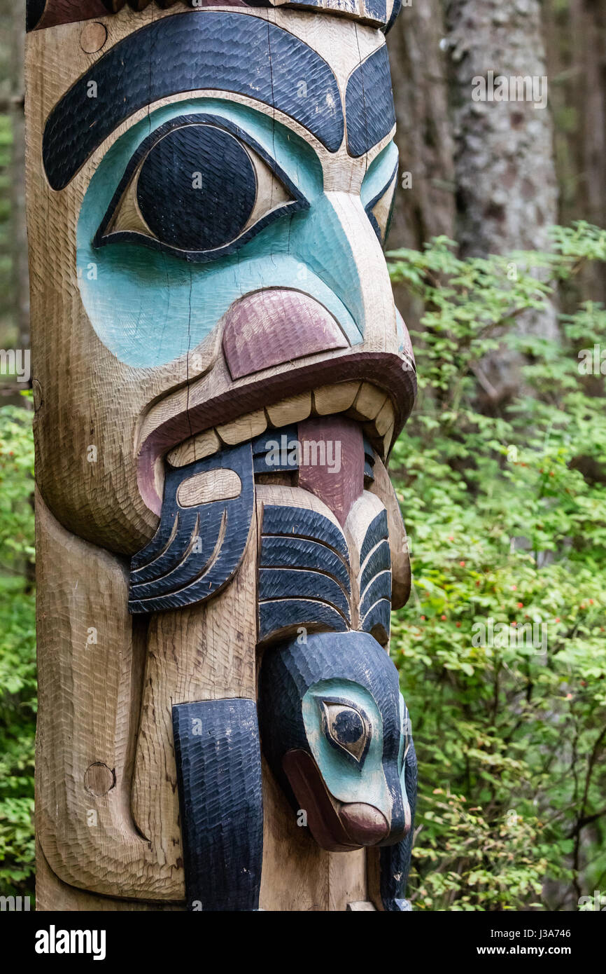 Native American totem poles in Alaska Stock Photo - Alamy