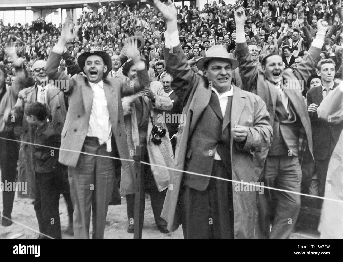 Cheering football fans Black and White Stock Photos & Images - Alamy