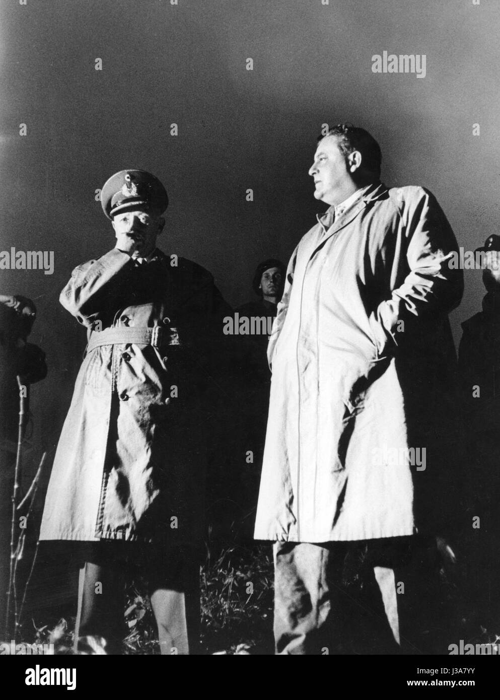 Adolf Heusinger and Franz Josef Strauss after the disaster on the Iller ...