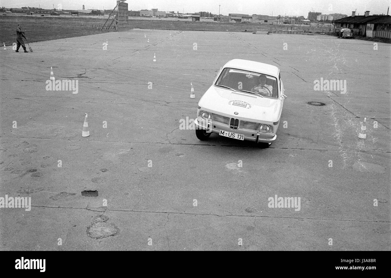 Test drive with a BMW 1800 on a test track, 1963 Stock Photo - Alamy