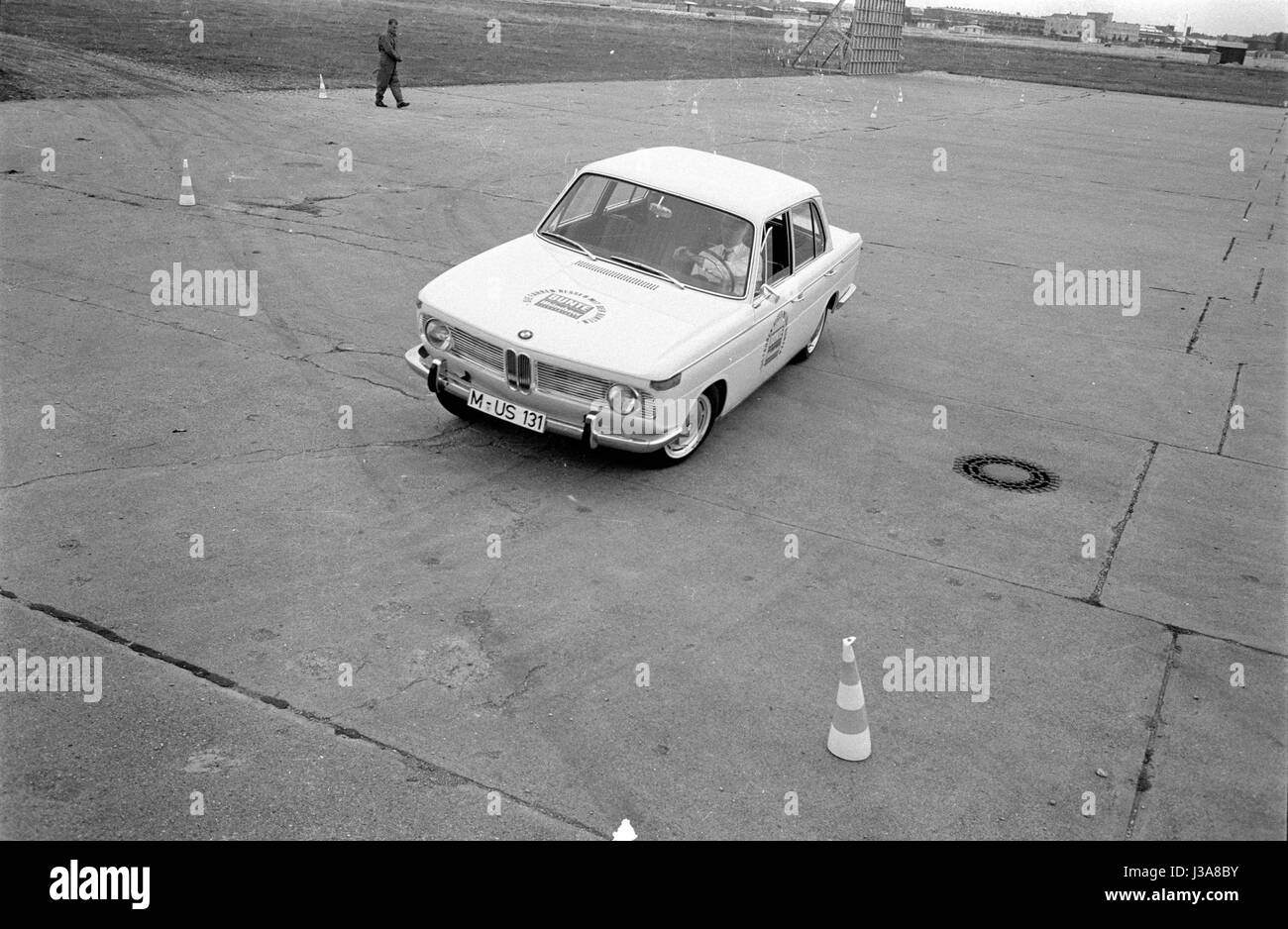 Test drive with a BMW 1800 on a test track, 1963 Stock Photo - Alamy