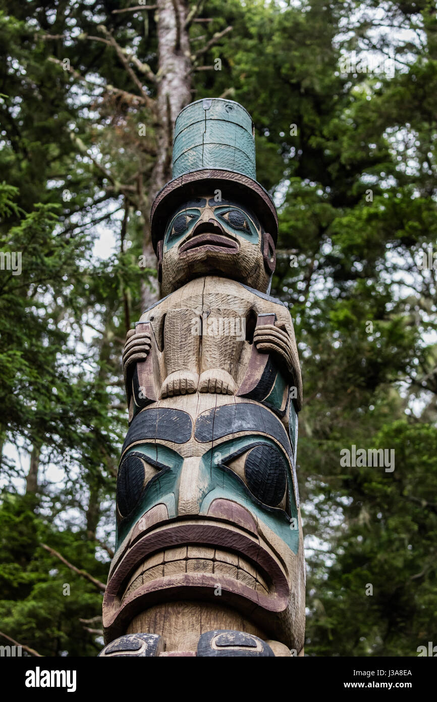 Native American totem poles in Alaska Stock Photo - Alamy
