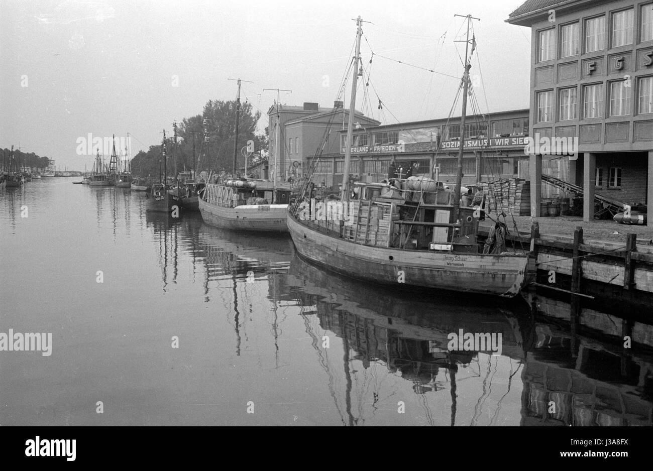 Moored boats in city Black and White Stock Photos & Images - Alamy