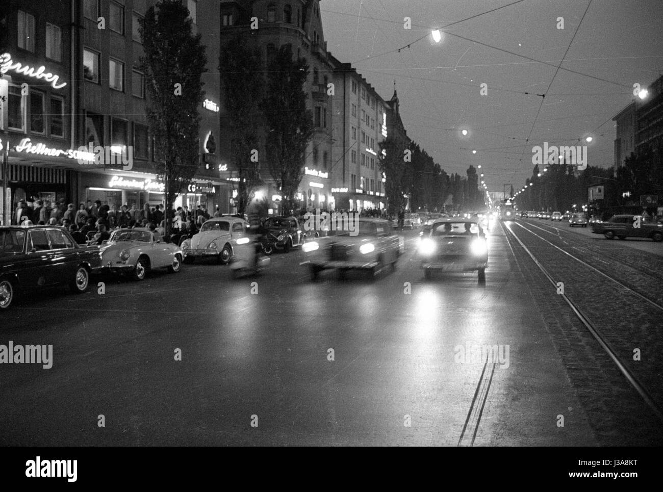 The Leopoldstrasse in Munich in the evening, 1963 Stock Photo - Alamy