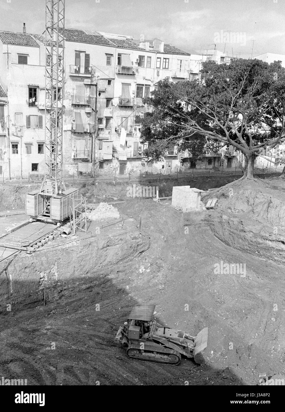 Worker construction site crane Black and White Stock Photos & Images ...