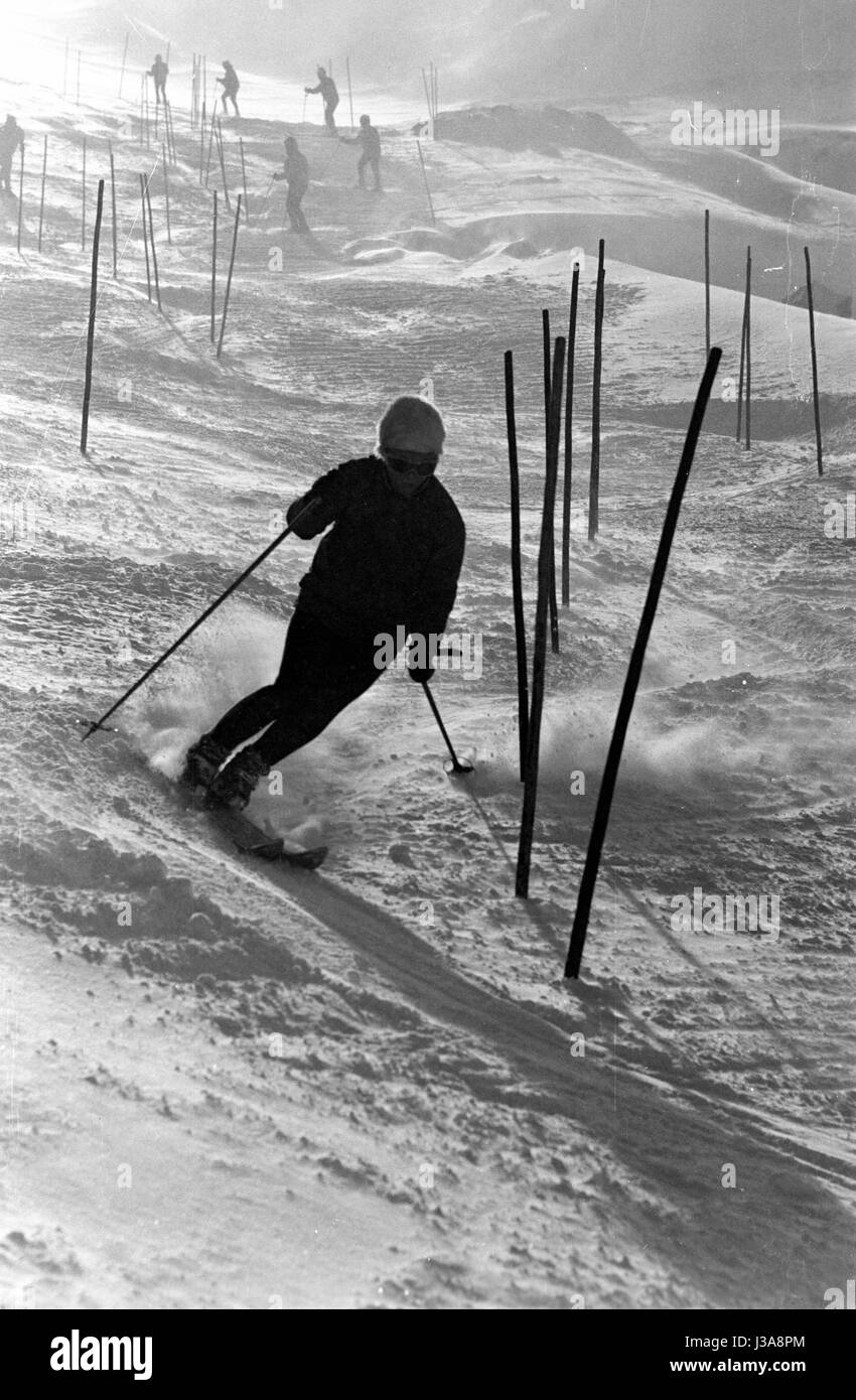 Skiers during slalom exercises on a slope on the Moelltal Glacier, 1962 ...