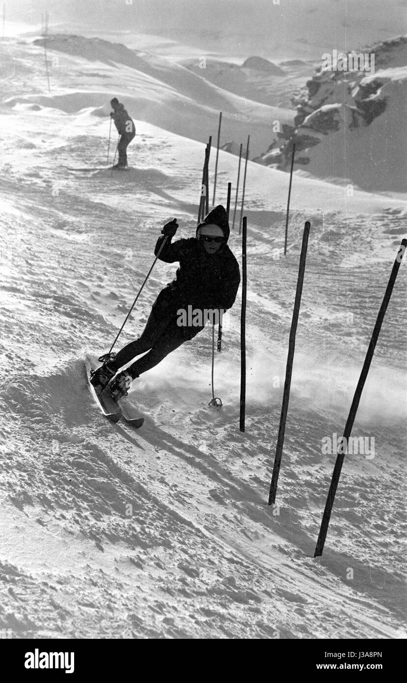 Skiers during slalom exercises on a slope on the Moelltal Glacier, 1962 ...