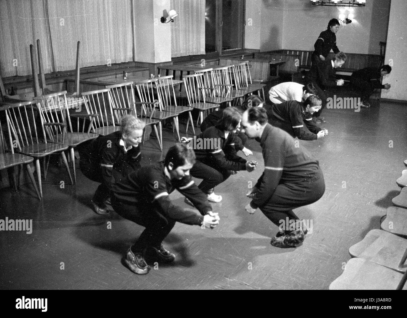 Skiers doing dry training, 1962 Stock Photo - Alamy