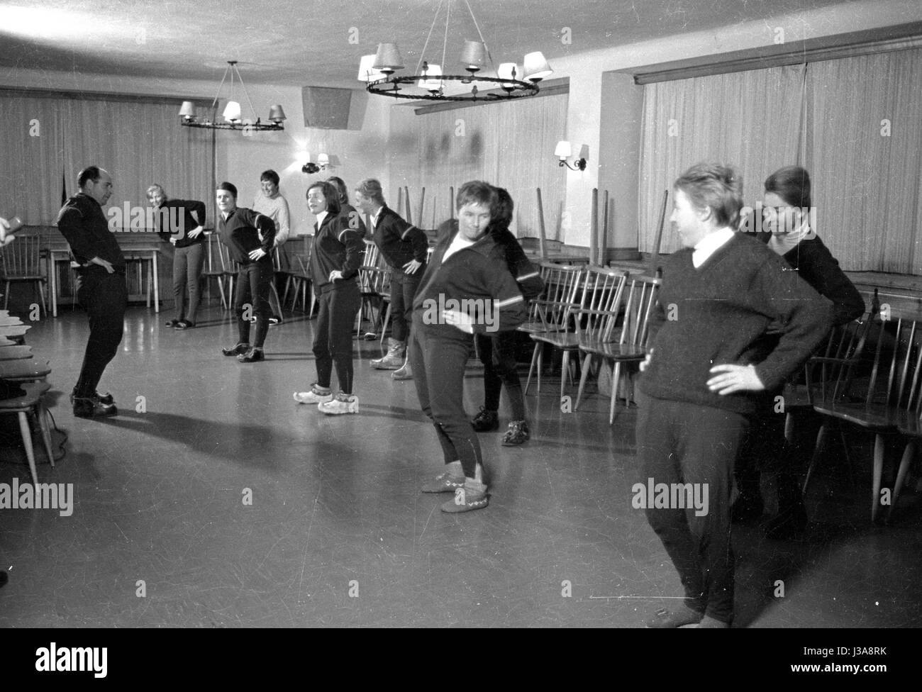 Athlete doing exercise on Black and White Stock Photos & Images - Alamy