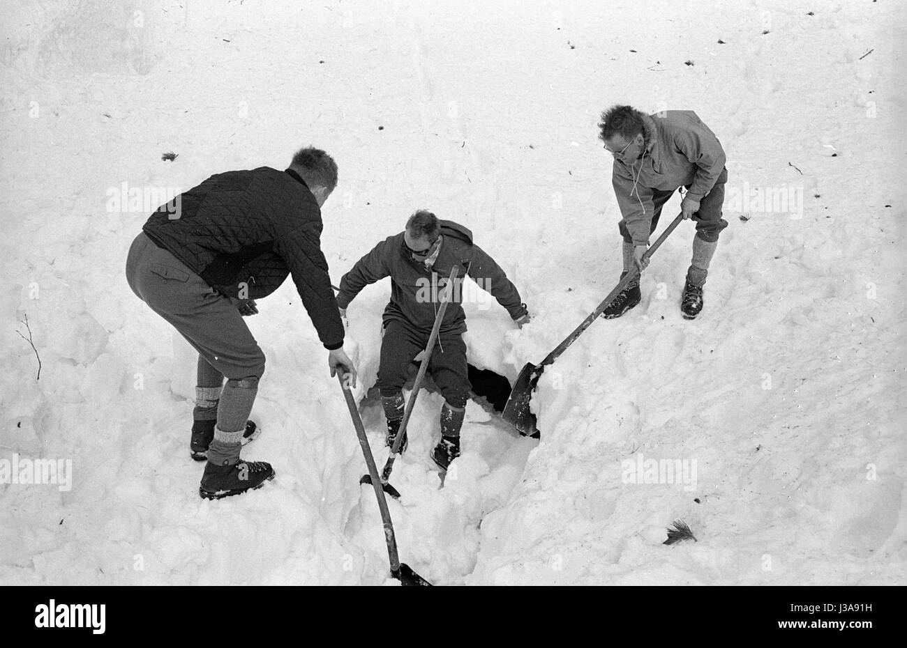 Mountain rescuers in action after an avalanche, 1961 Stock Photo - Alamy