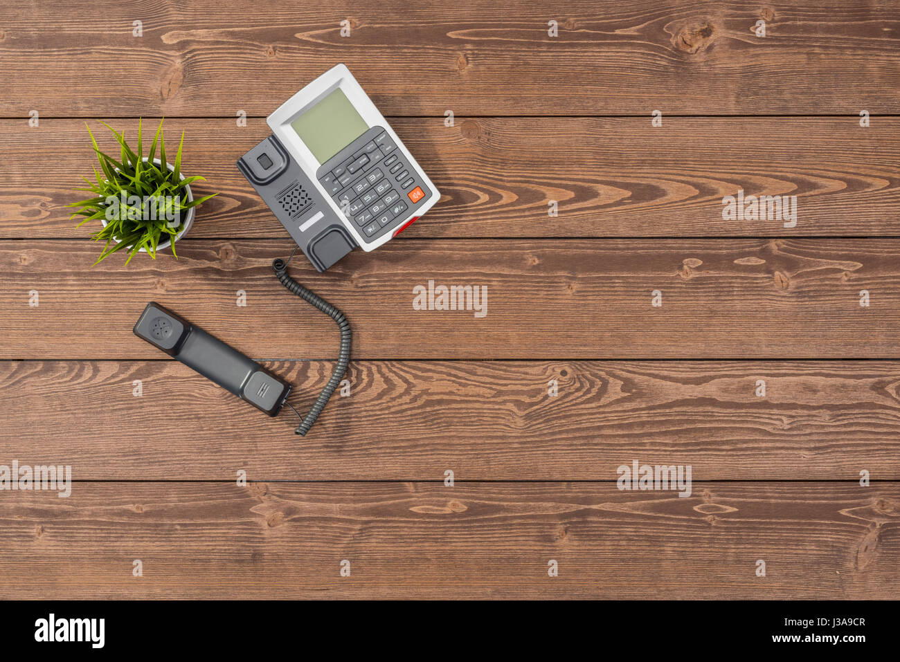 Empty office desk with telephone Stock Photo - Alamy