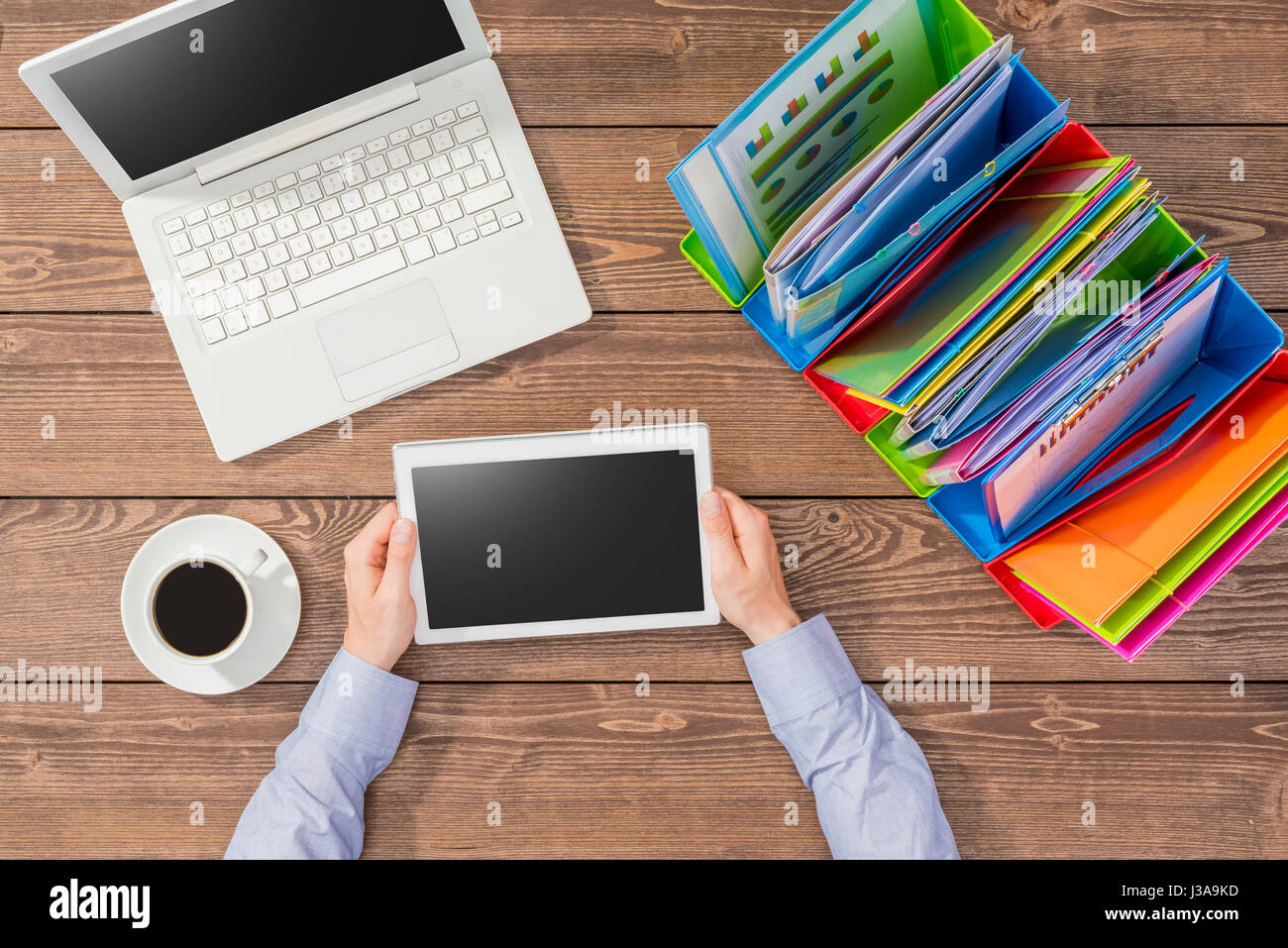 Man using tablet documents hi-res stock photography and images - Alamy