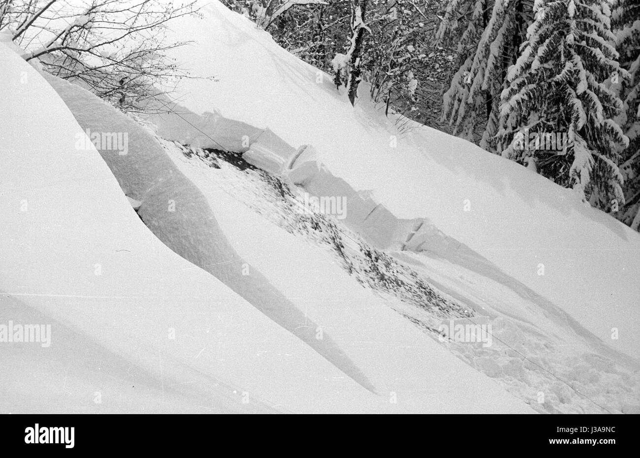 Buried house after the avalanches in Blons, 1954 Stock Photo - Alamy