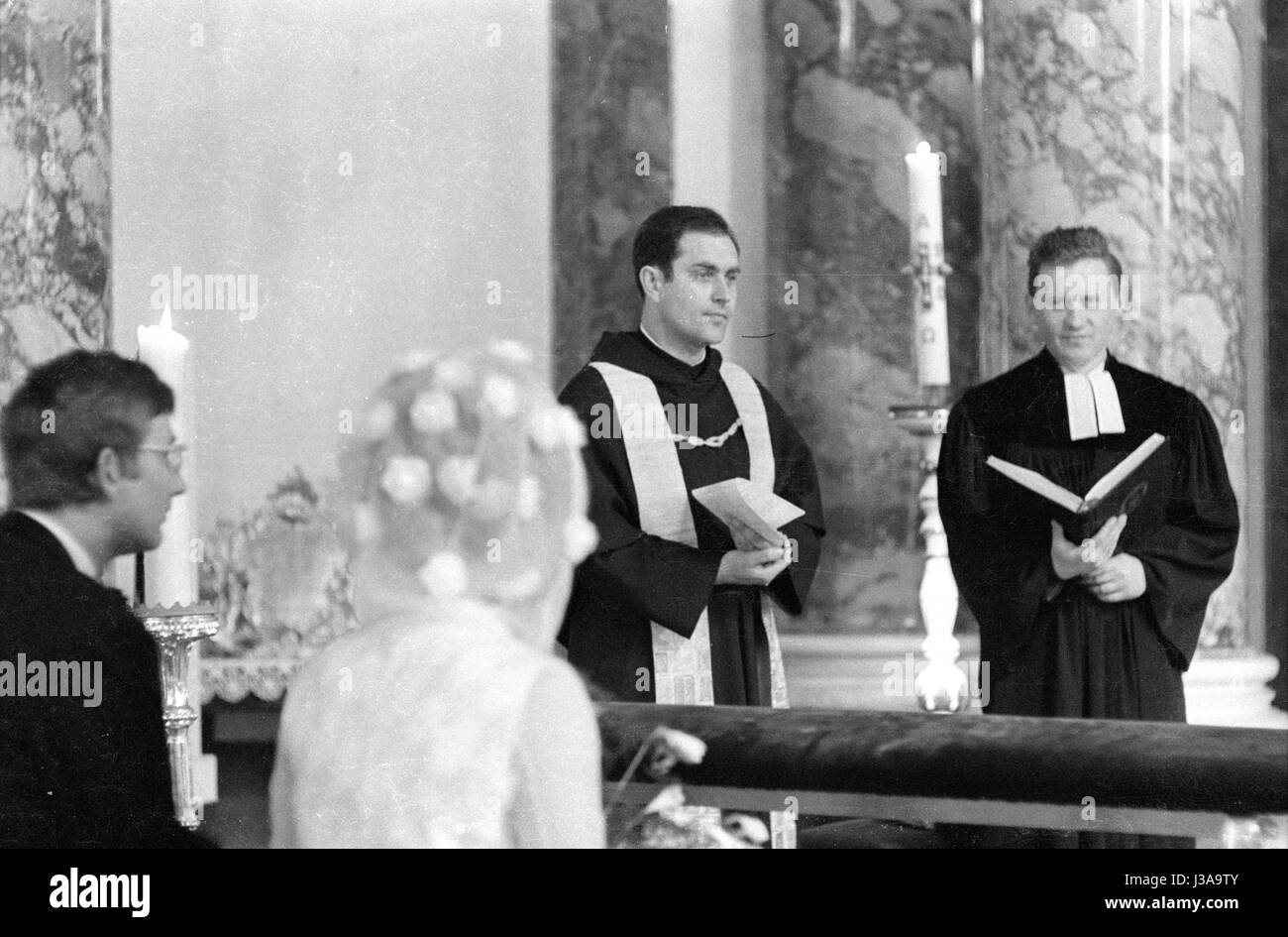 Catholic priest confession Black and White Stock Photos & Images - Alamy