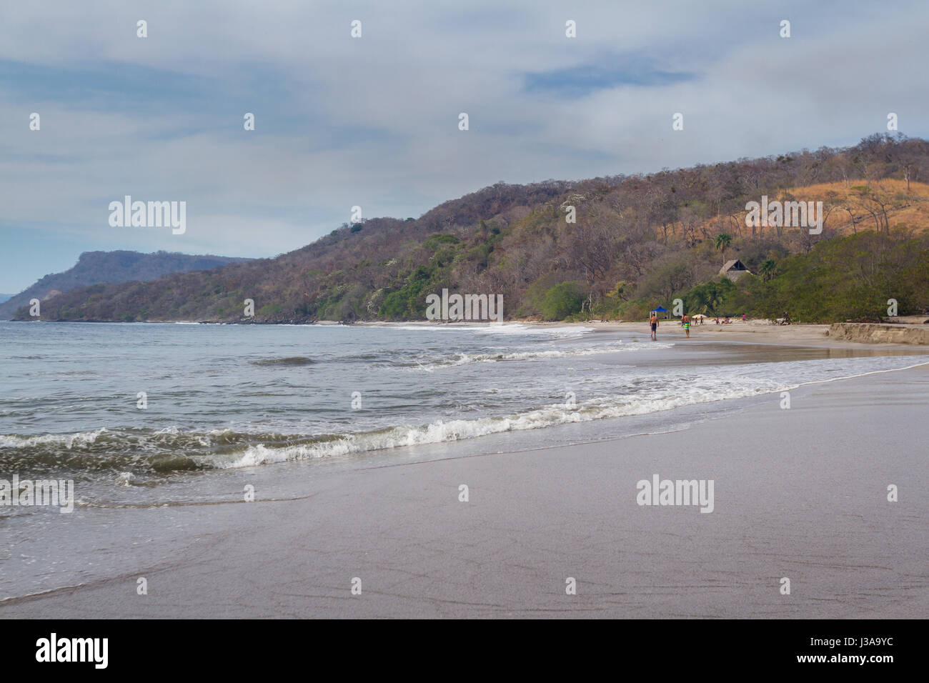 relaxing beach Cabuyal in Guanacaste Costa Rica with a few people at ...