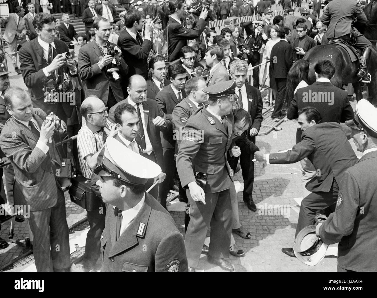 Policemen and some members of the Iranian secret service arrest ...