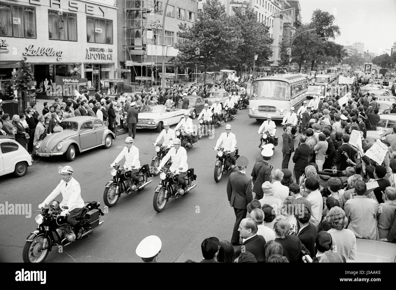 Police is escorting the Iranian visitors through Berlin, 1967 Stock ...