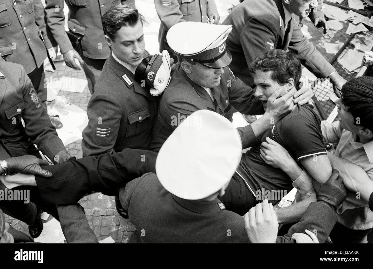 Arresting of an demonstrator during the Shahs visit in Berlin, 1967 ...