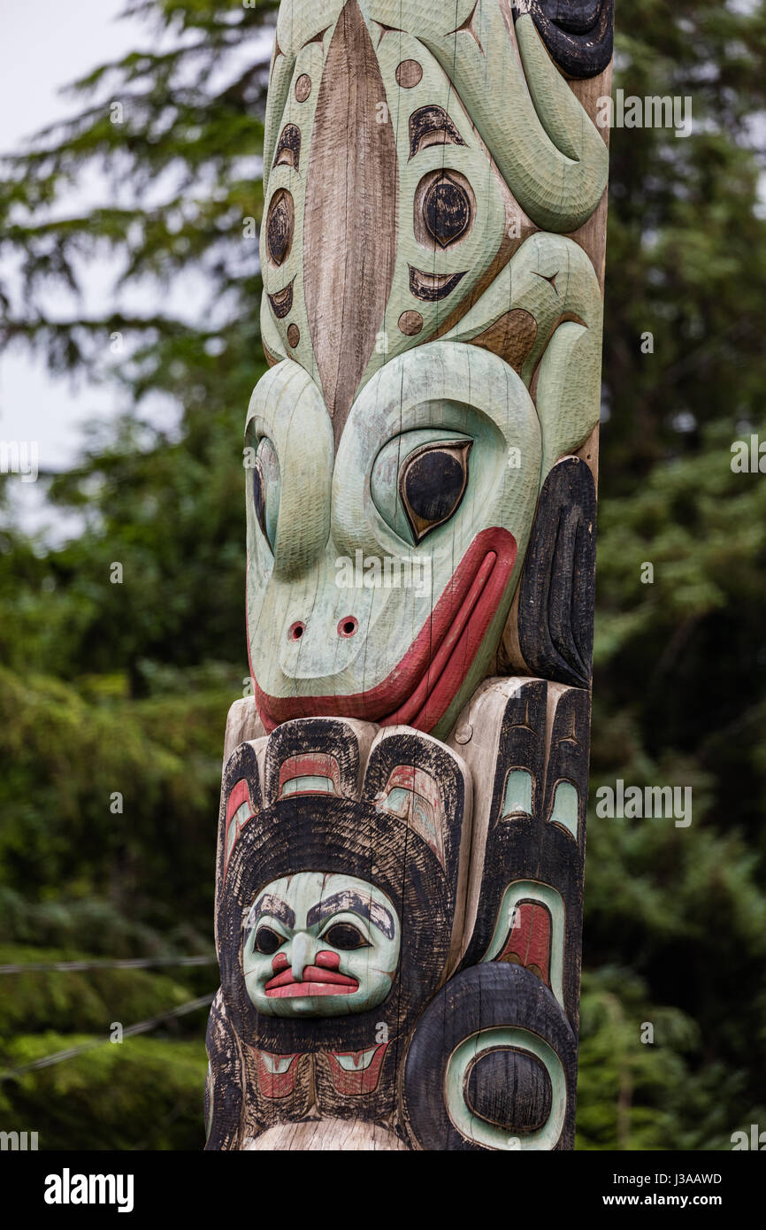 Native American totem poles in Alaska Stock Photo - Alamy