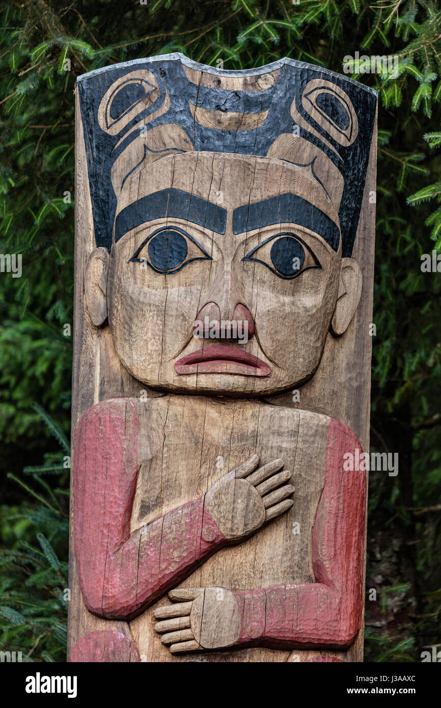 Native American totem poles in Alaska Stock Photo - Alamy