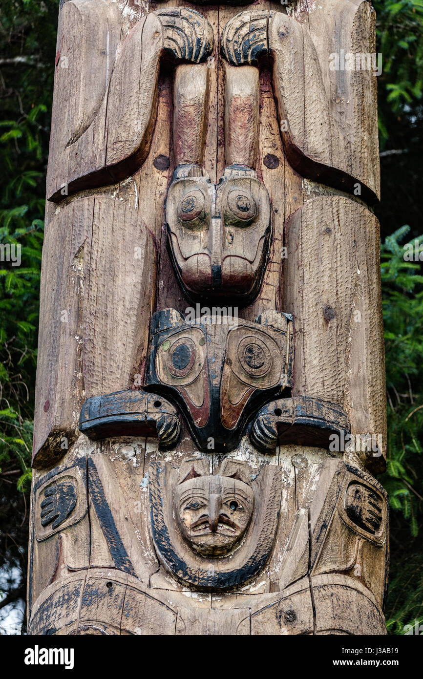 Native American totem poles in Alaska Stock Photo - Alamy