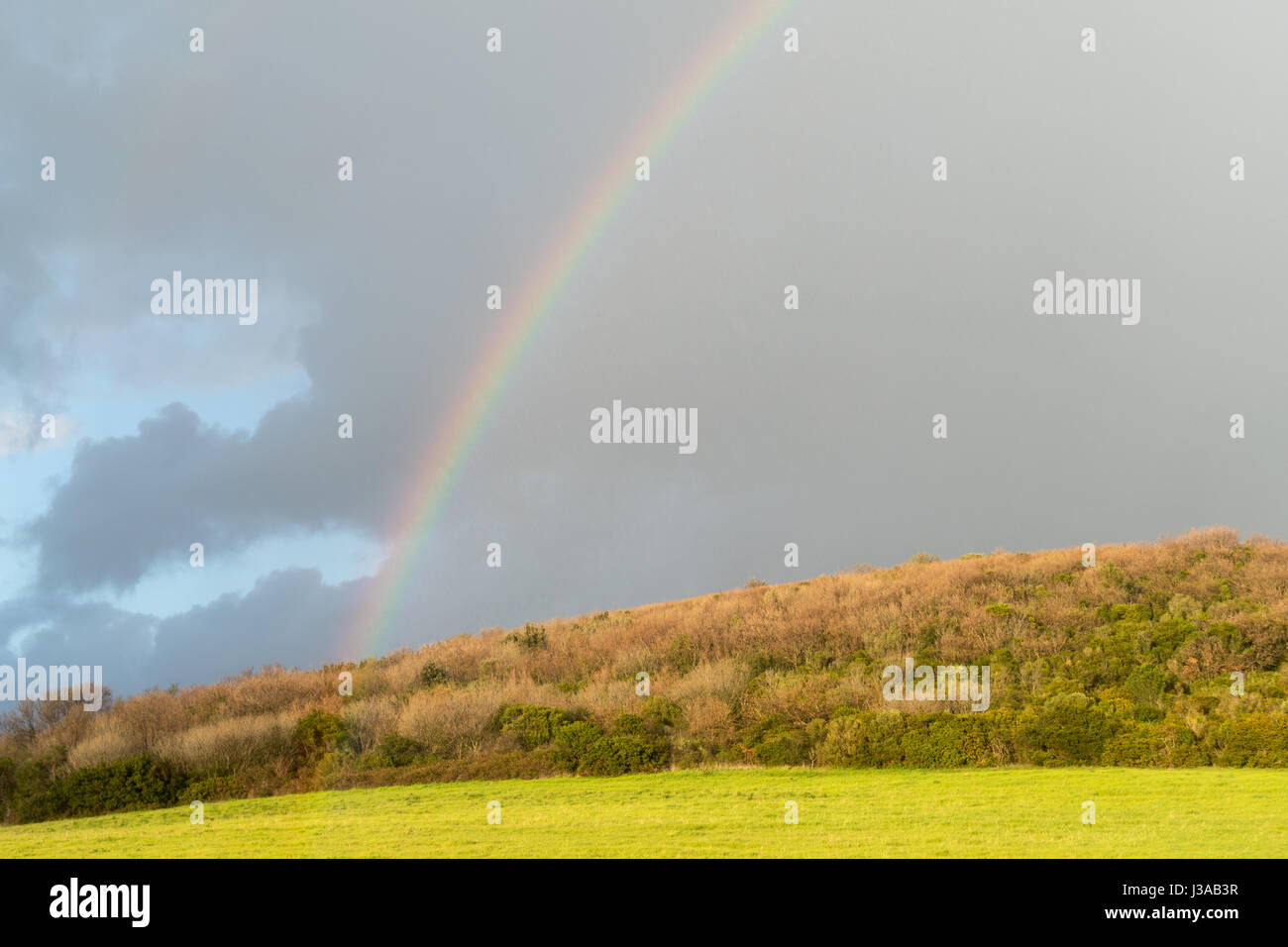 Rainbow reaching ground hi-res stock photography and images - Alamy