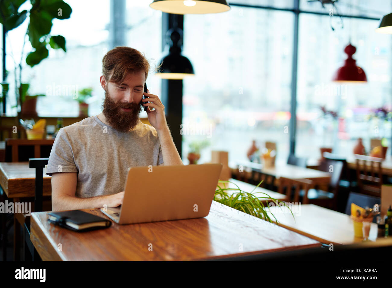 Interior Designer Talking to Client Stock Photo - Alamy