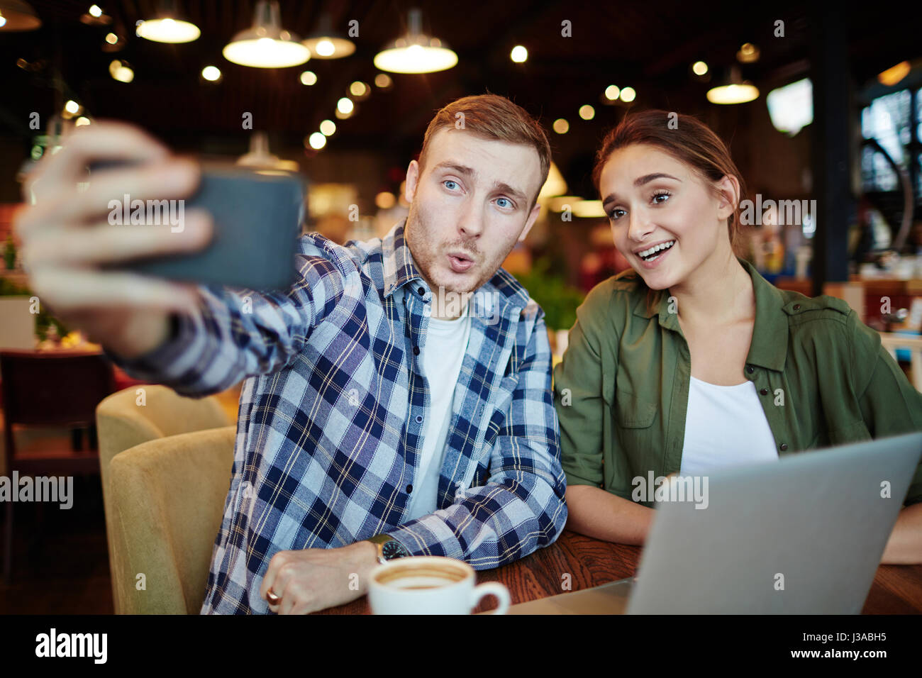 Taking Selfie with Pretty Friend Stock Photo - Alamy
