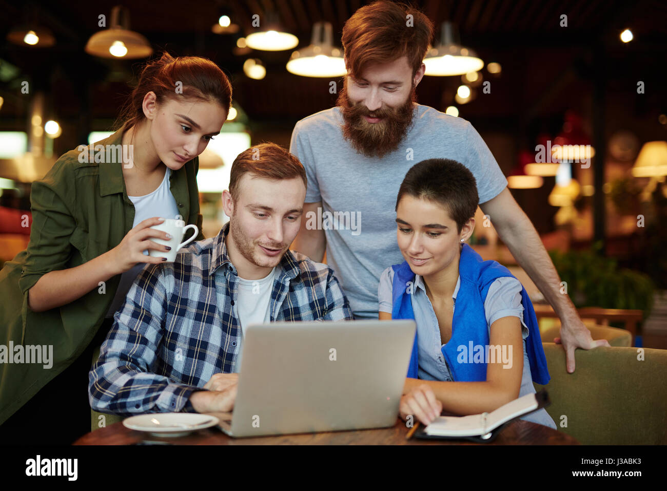 Showing Work Results to Coworkers Stock Photo - Alamy