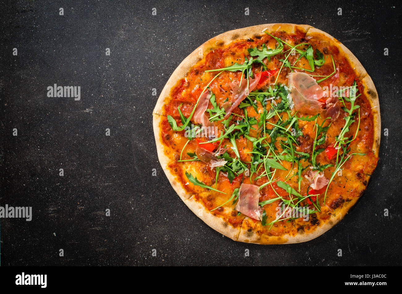 Pizza salami ham cheese black hi-res stock photography and images - Alamy
