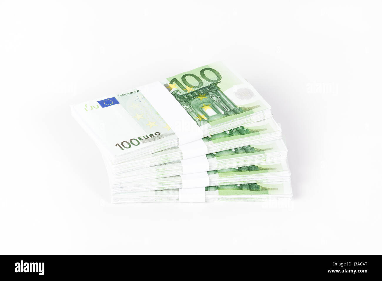 Stacks of 100 Euro Banknotes isolated on white background Stock Photo ...