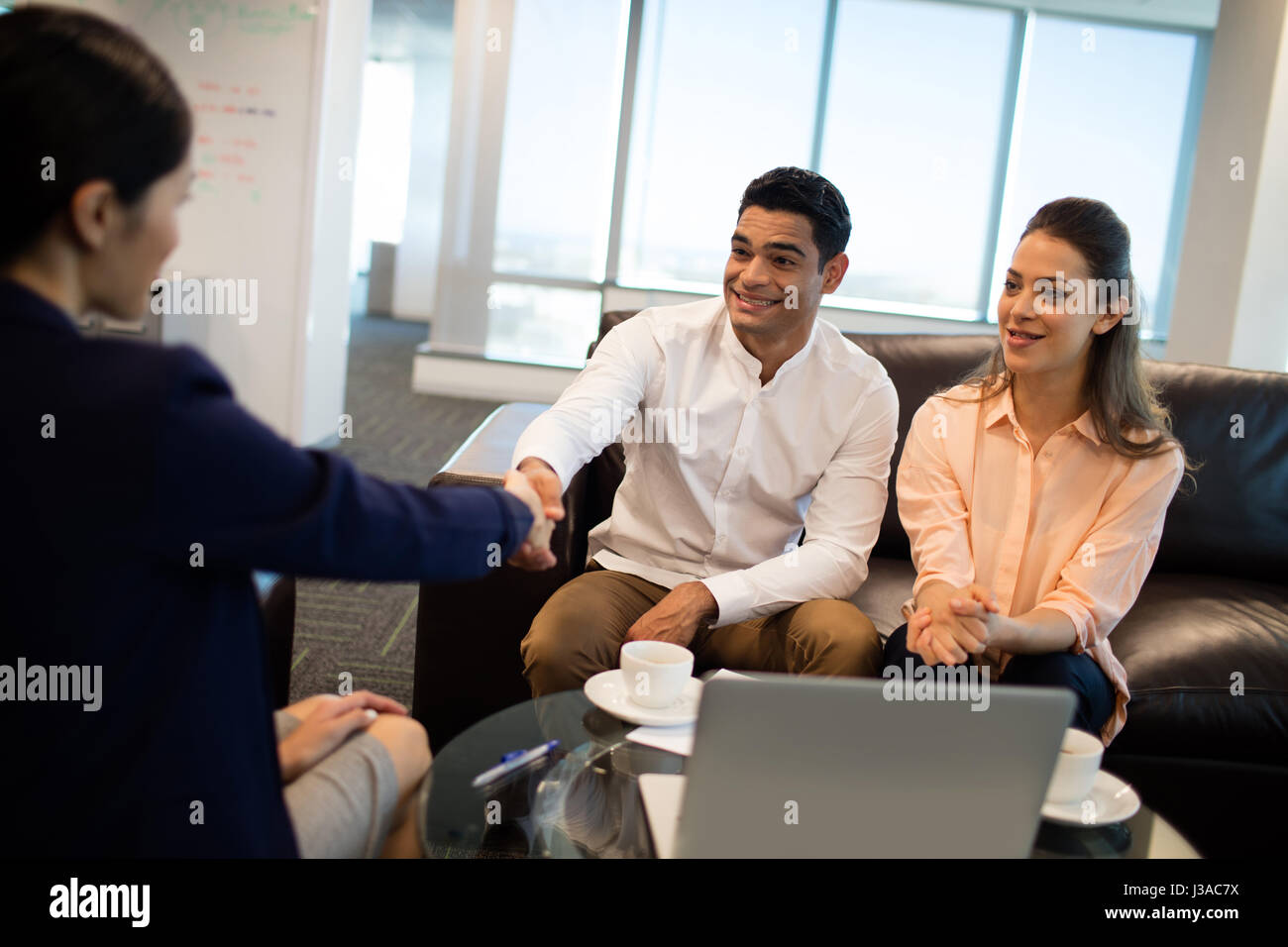 Chinese businessman female colleague hi-res stock photography and ...