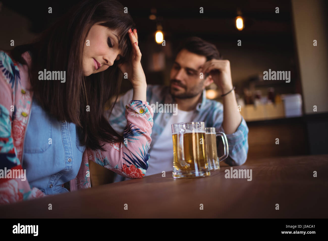 Woman clubbing sad hi-res stock photography and images - Alamy