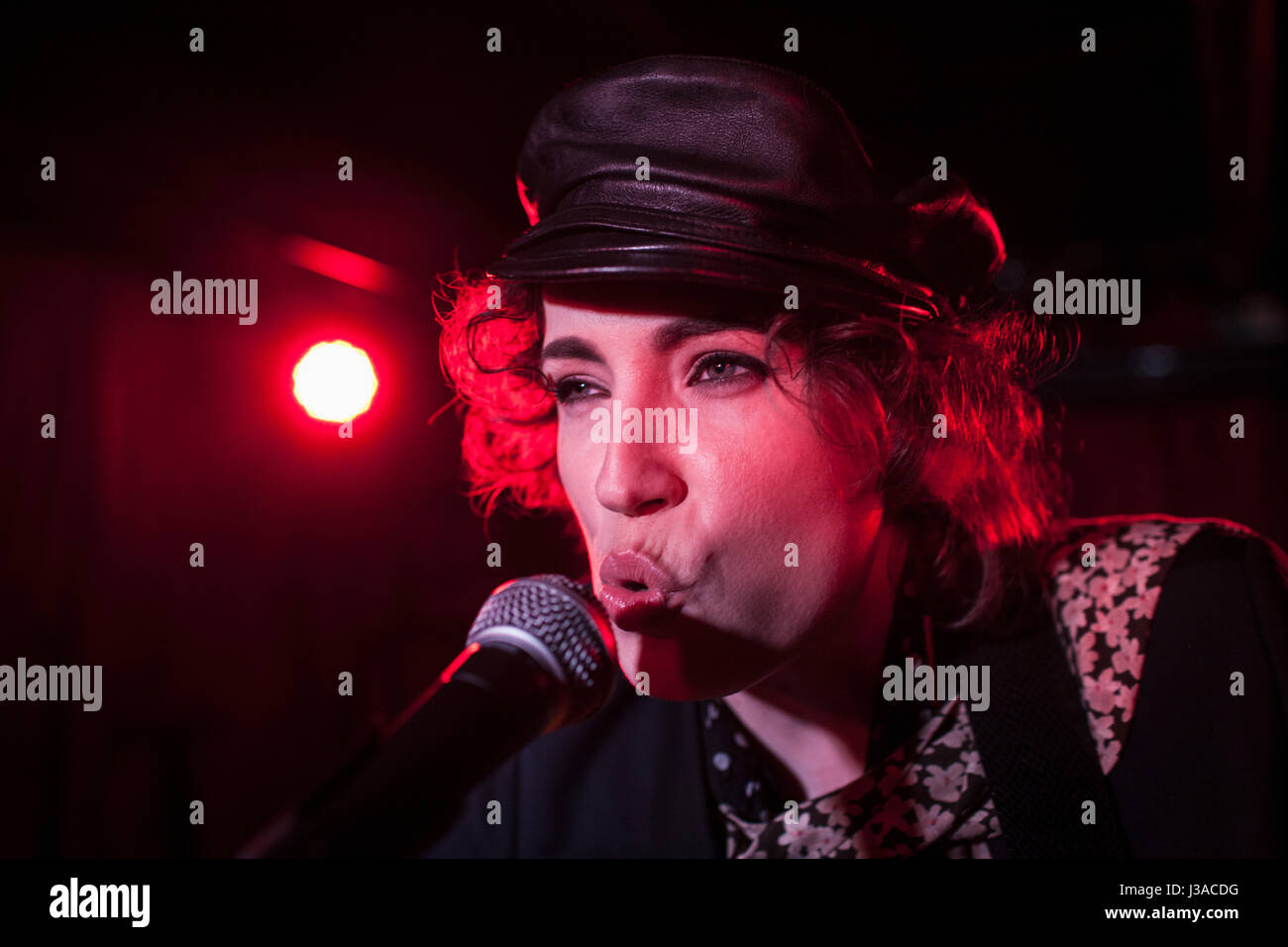 Singer performing at a nightclub Stock Photo - Alamy