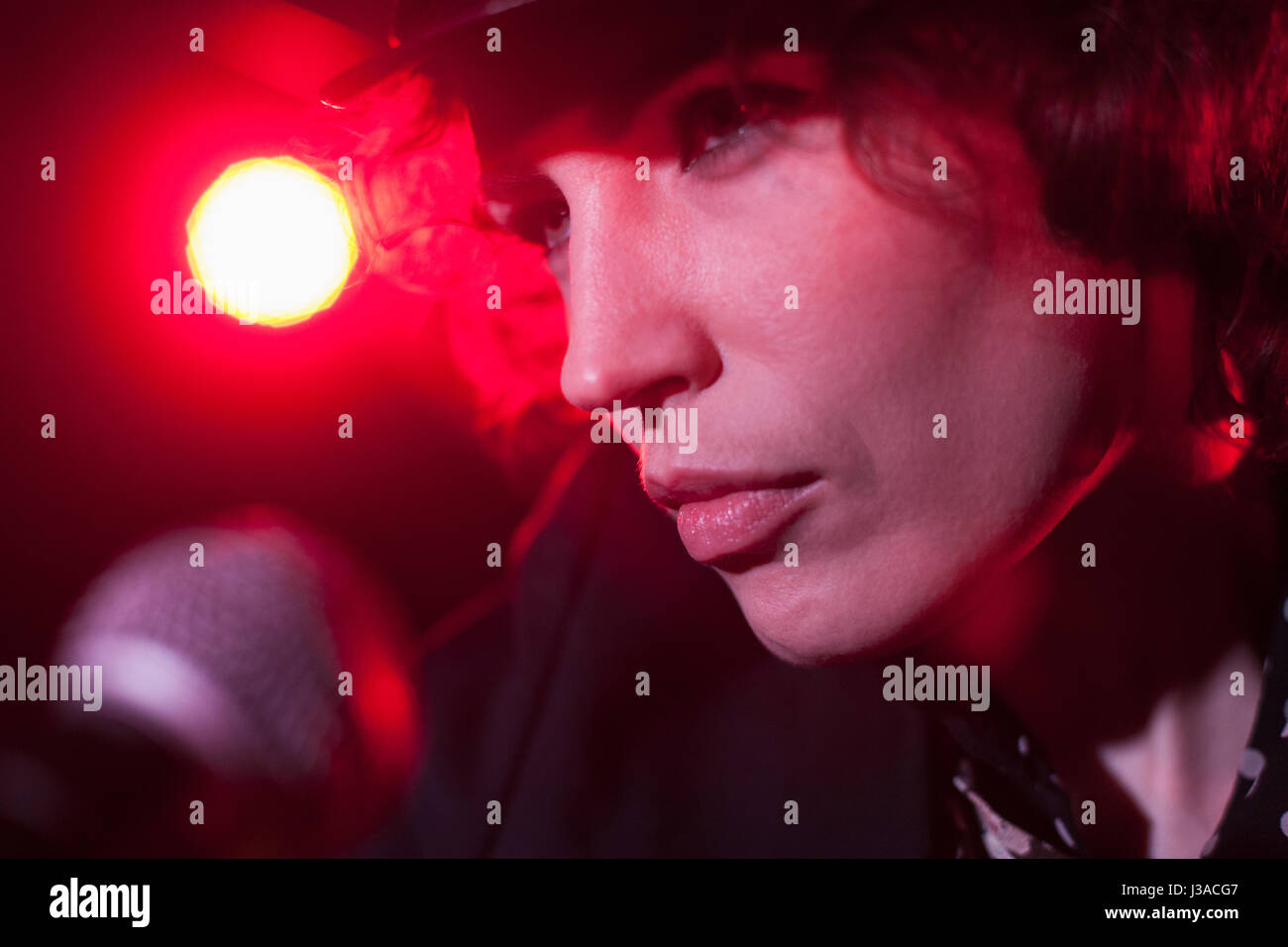 Singer performing at a nightclub Stock Photo - Alamy