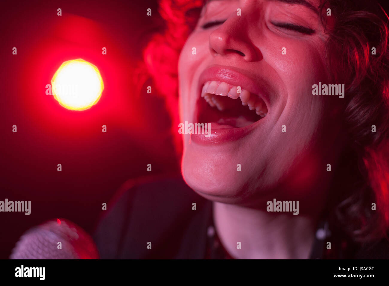 Singer performing at a nightclub Stock Photo - Alamy