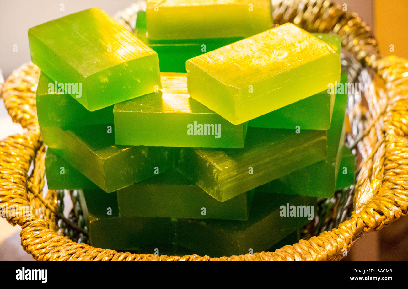 Collection of bars of fragrant hand made organic soap in a basket Stock ...
