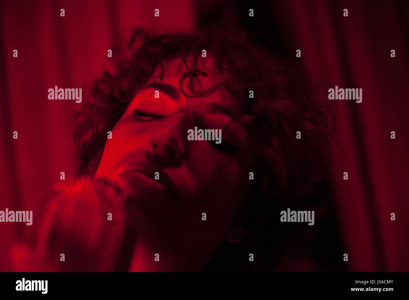 Singer performing at a nightclub Stock Photo - Alamy