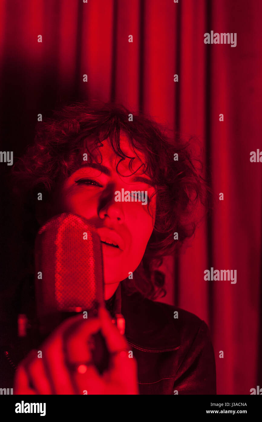 Singer performing at a nightclub Stock Photo - Alamy