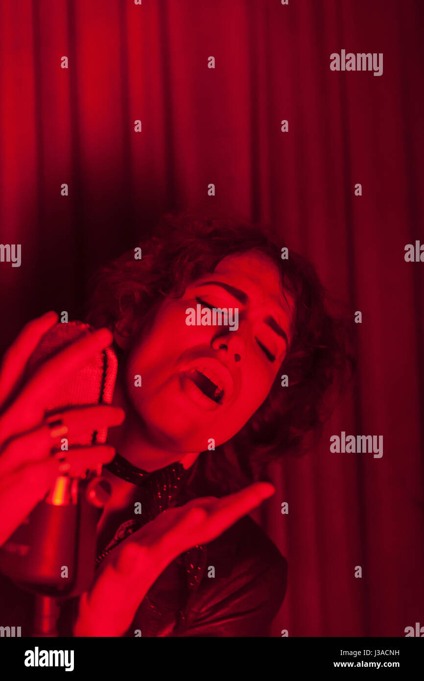 Singer performing at a nightclub Stock Photo - Alamy