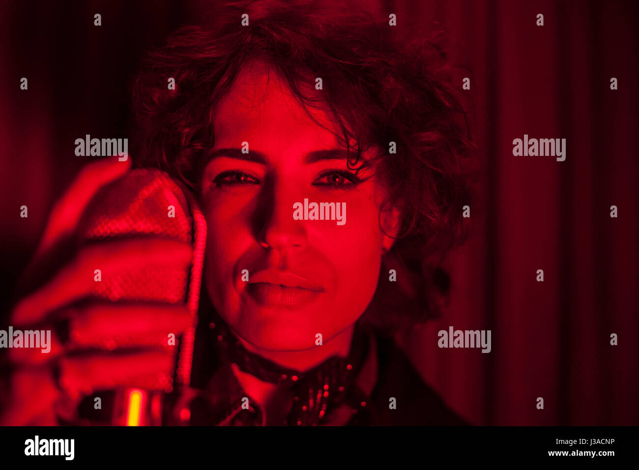 Singer performing at a nightclub Stock Photo - Alamy