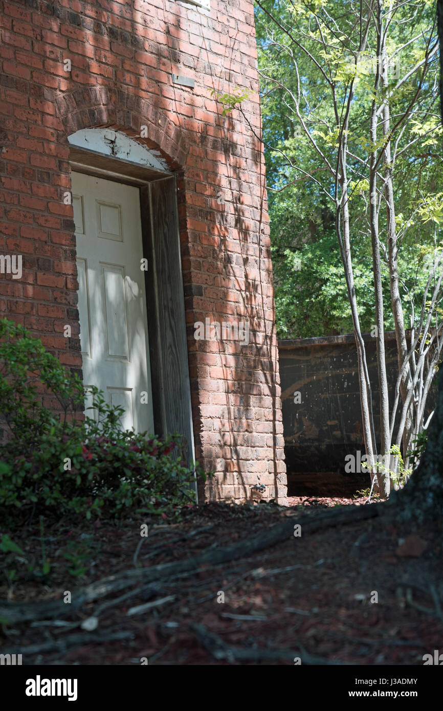 Old door of brick building Stock Photo - Alamy