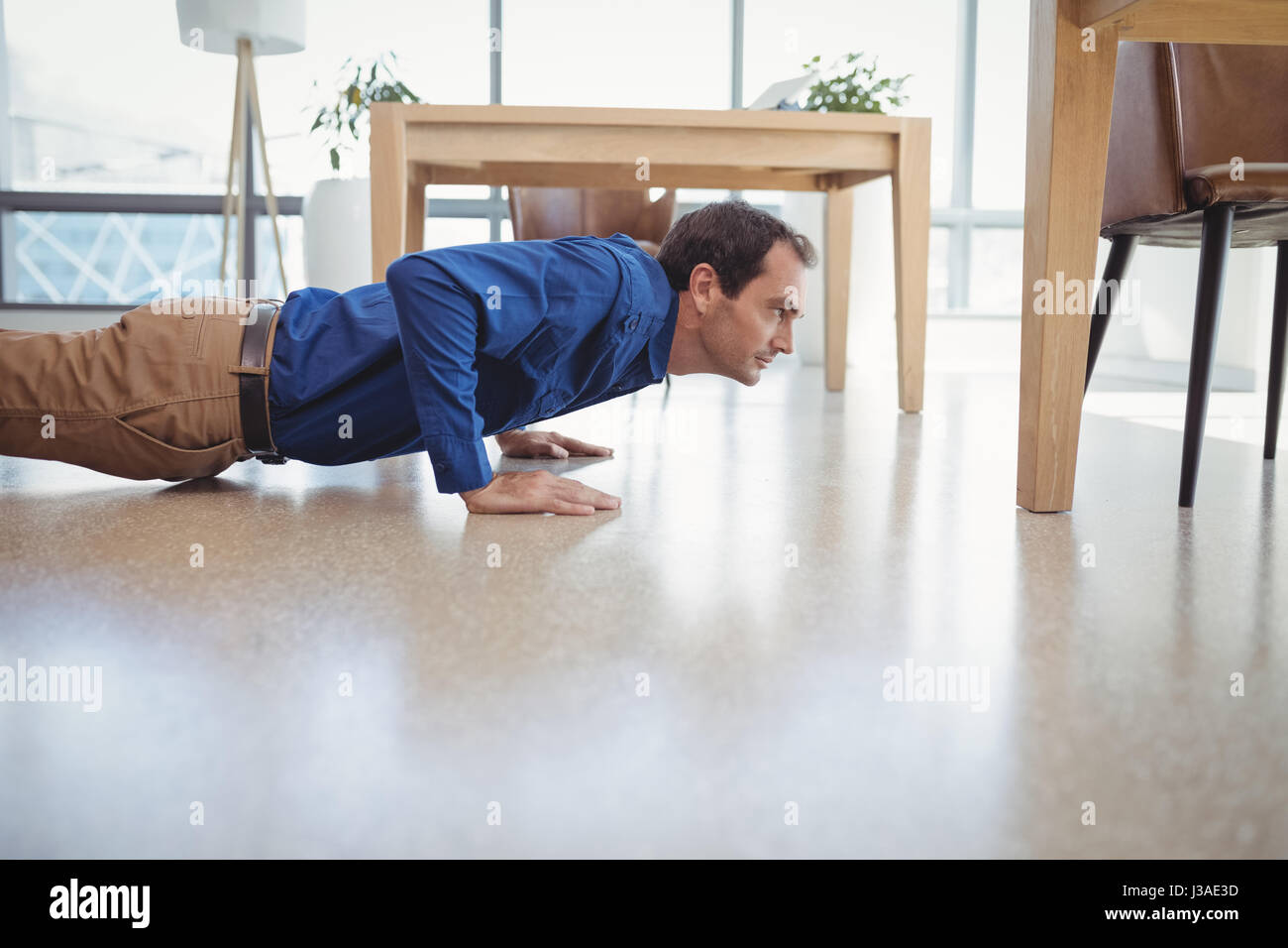 Man push ups chair hi-res stock photography and images - Alamy