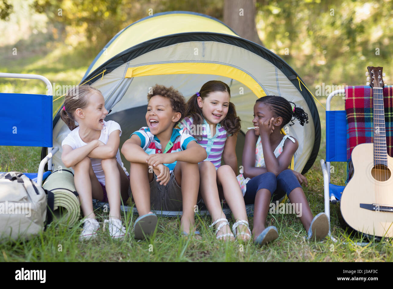 Sitting in red tent hi-res stock photography and images - Alamy